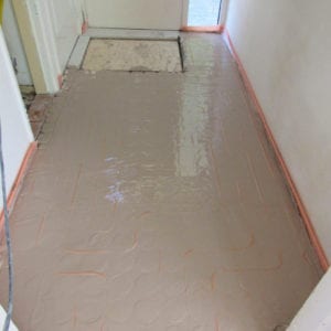 Vloerverwarming op bestaande houten vloer? Ontdek Variokomp